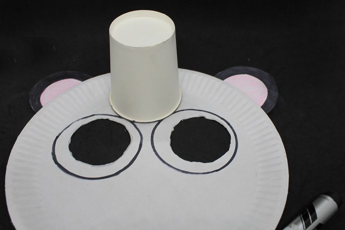 Make a Lovely Paper Plate Panda Bear Mask - diy-magazine.com