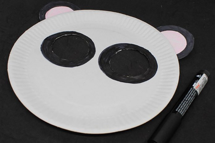 Make a Lovely Paper Plate Panda Bear Mask - diy-magazine.com